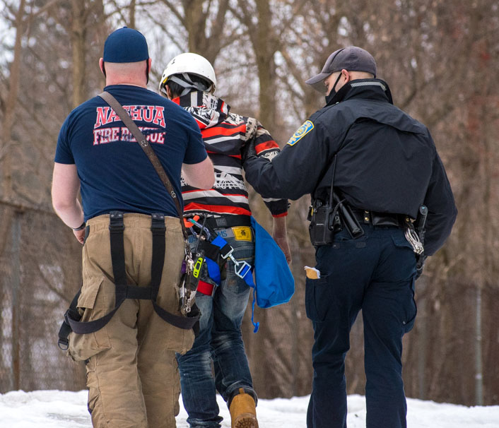 Using ropes, safety harnesses, technical rescue skills and patience ...